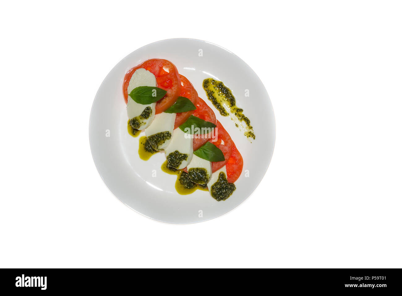 Traditional Italian Caprese salad on the plate. Top view. Isolated on ...