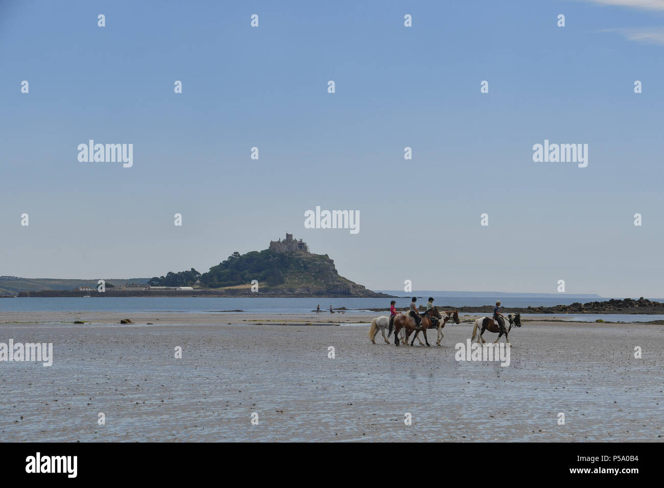 Uk 26th june 2018 uk weather horse riders beach longrock hi-res stock ...