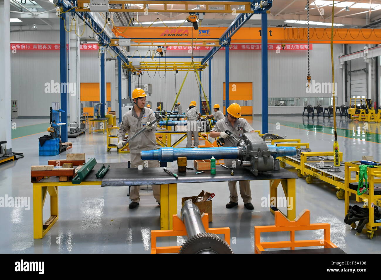 Taiyuan, China's Shanxi Province. 26th June, 2018. Workers assemble a ...
