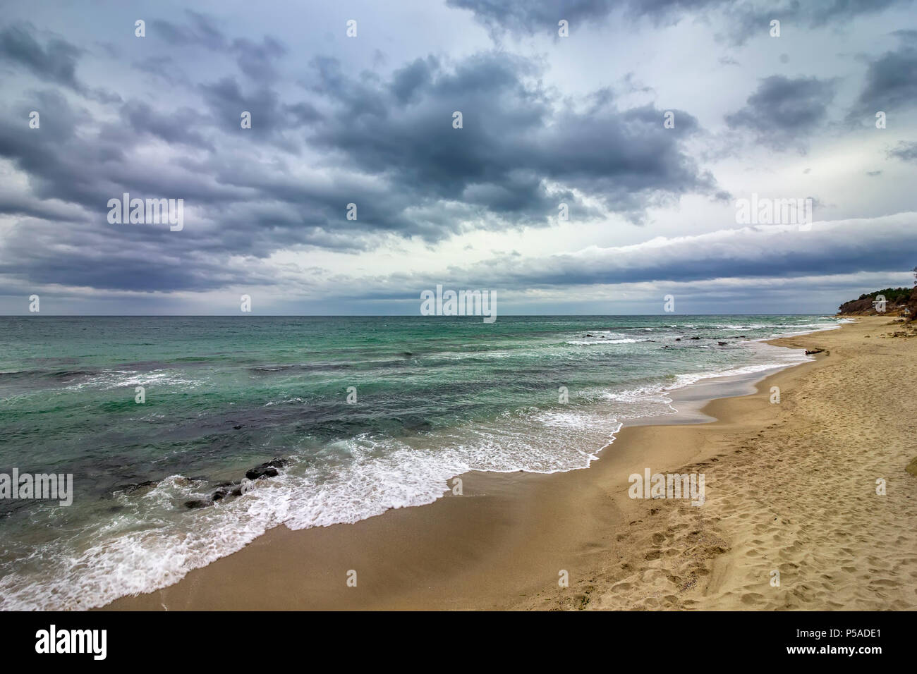 Cloudy mood over a beach hi-res stock photography and images - Alamy