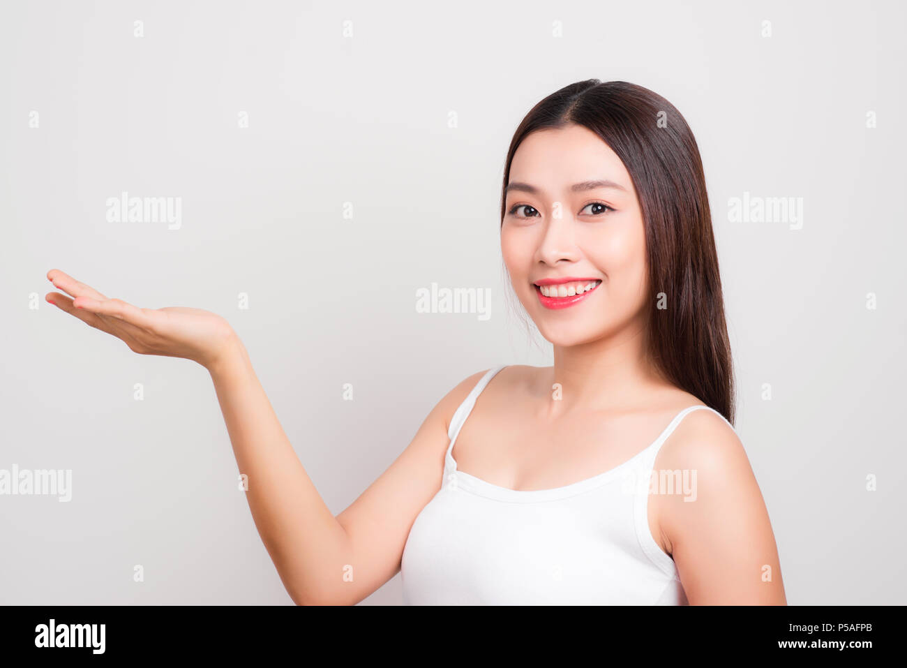 Girl showing open hand High Resolution Stock Photography and Images - Alamy