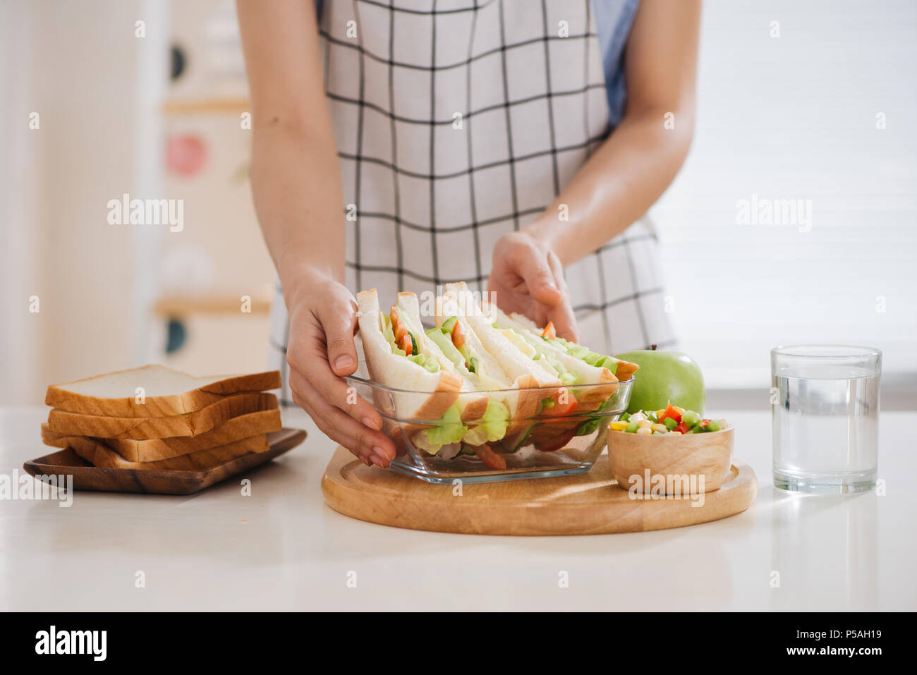 Asian female preparing food (fruits and vegetables) for healthy eating ...