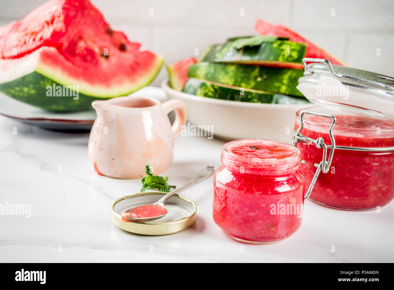 Homemade sweet watermelon jam, white marble background copy space Stock ...