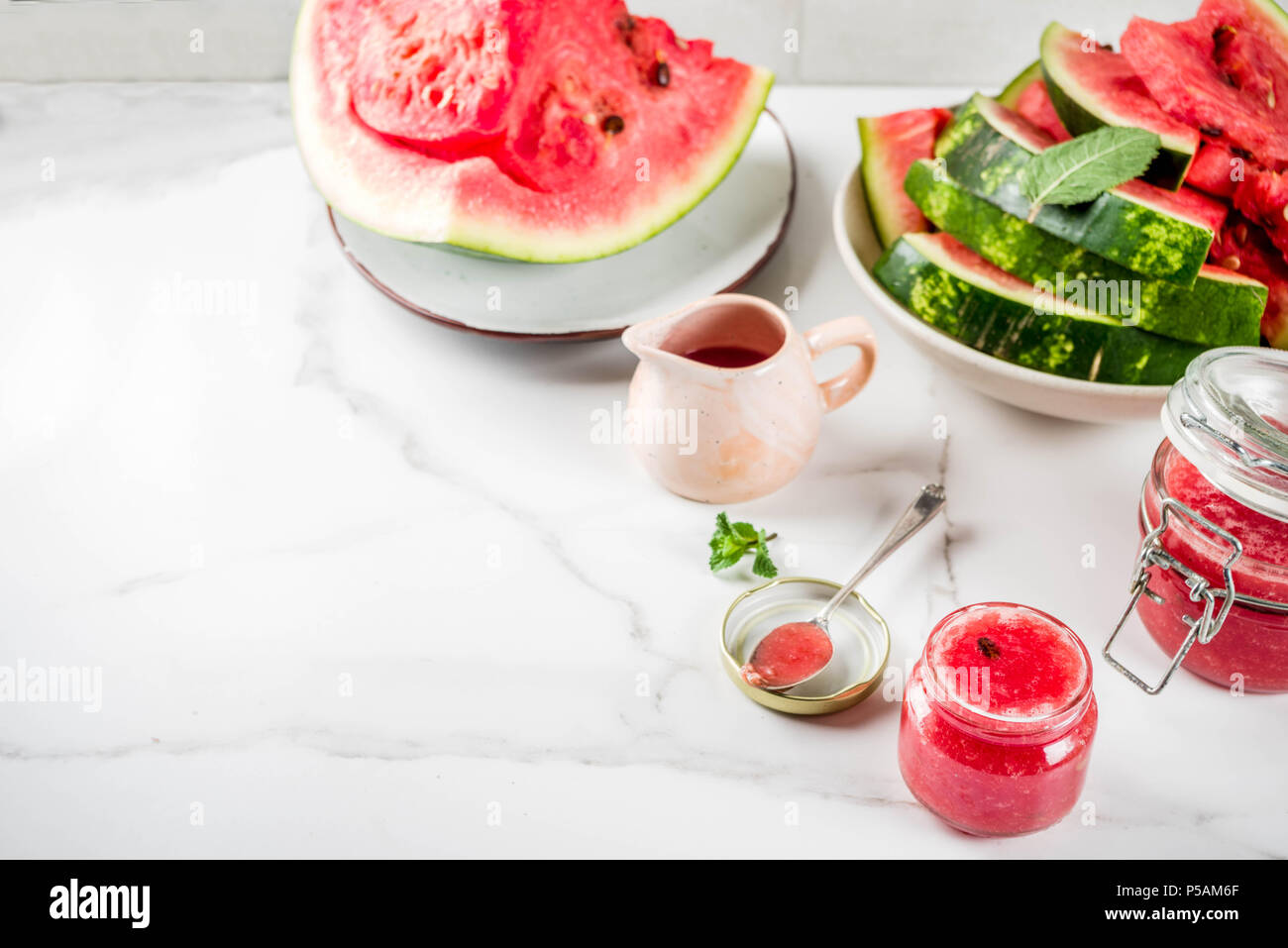 Homemade sweet watermelon jam, white marble background copy space Stock ...