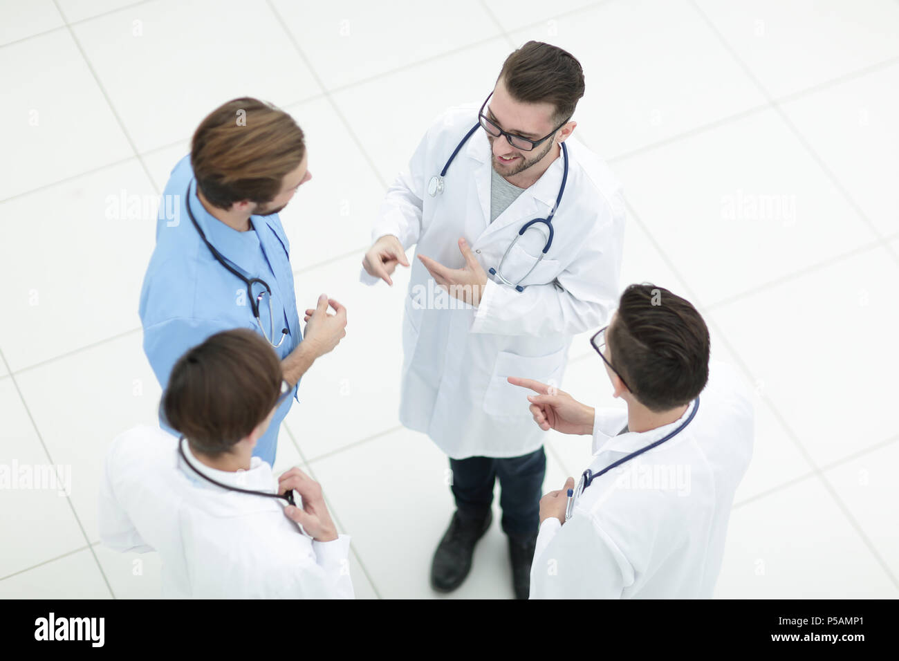 view from the top.a group of doctors discussing ideas Stock Photo - Alamy