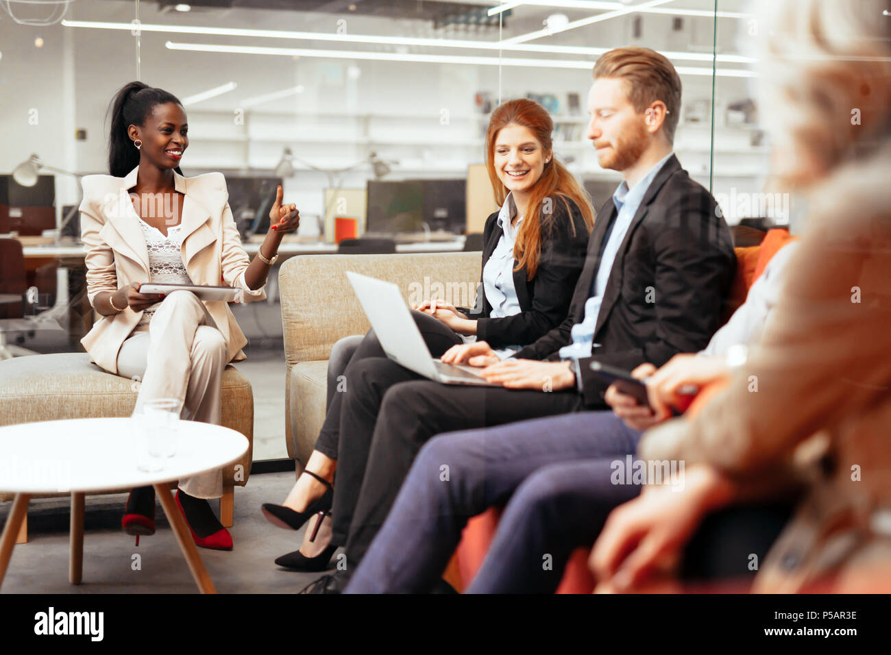 Business people conversation. Technology at hand Stock Photo - Alamy