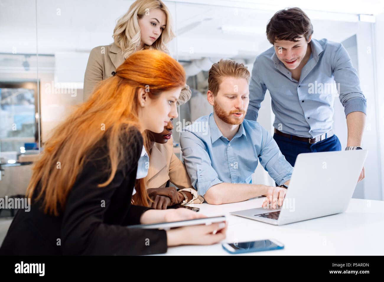 Creative business people brainstorming Stock Photo - Alamy
