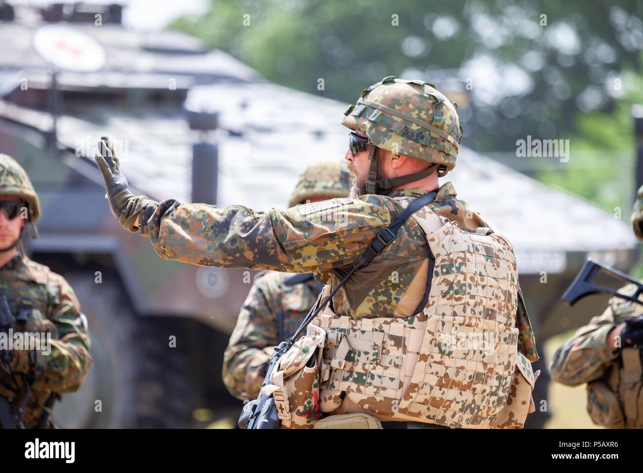 FELDKIRCHEN / GERMANY - JUNE 9, 2018: German soldier instructs soldiers ...