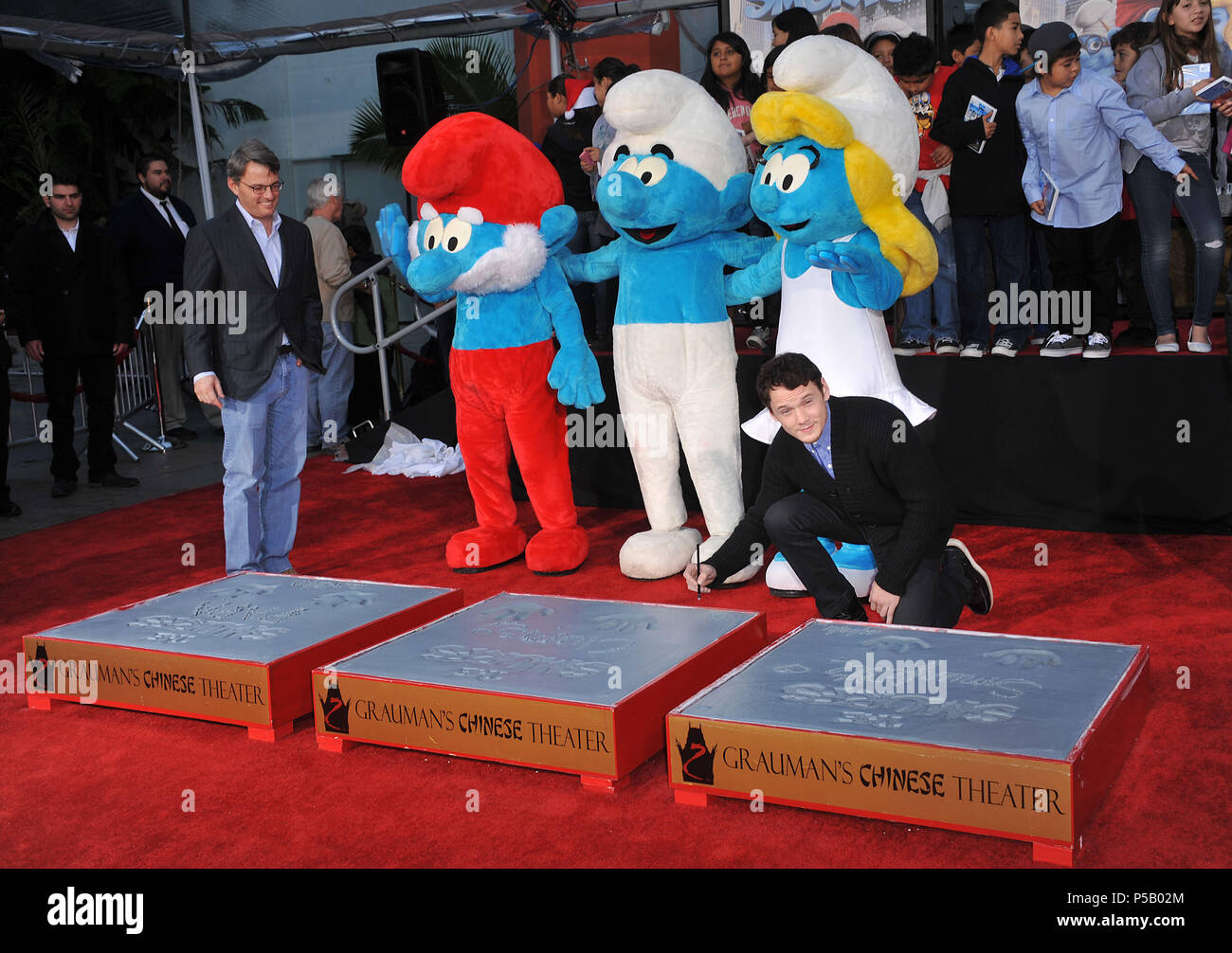 The Smurfs Honored with Hand and Footprints at the Chinese Theatre In ...