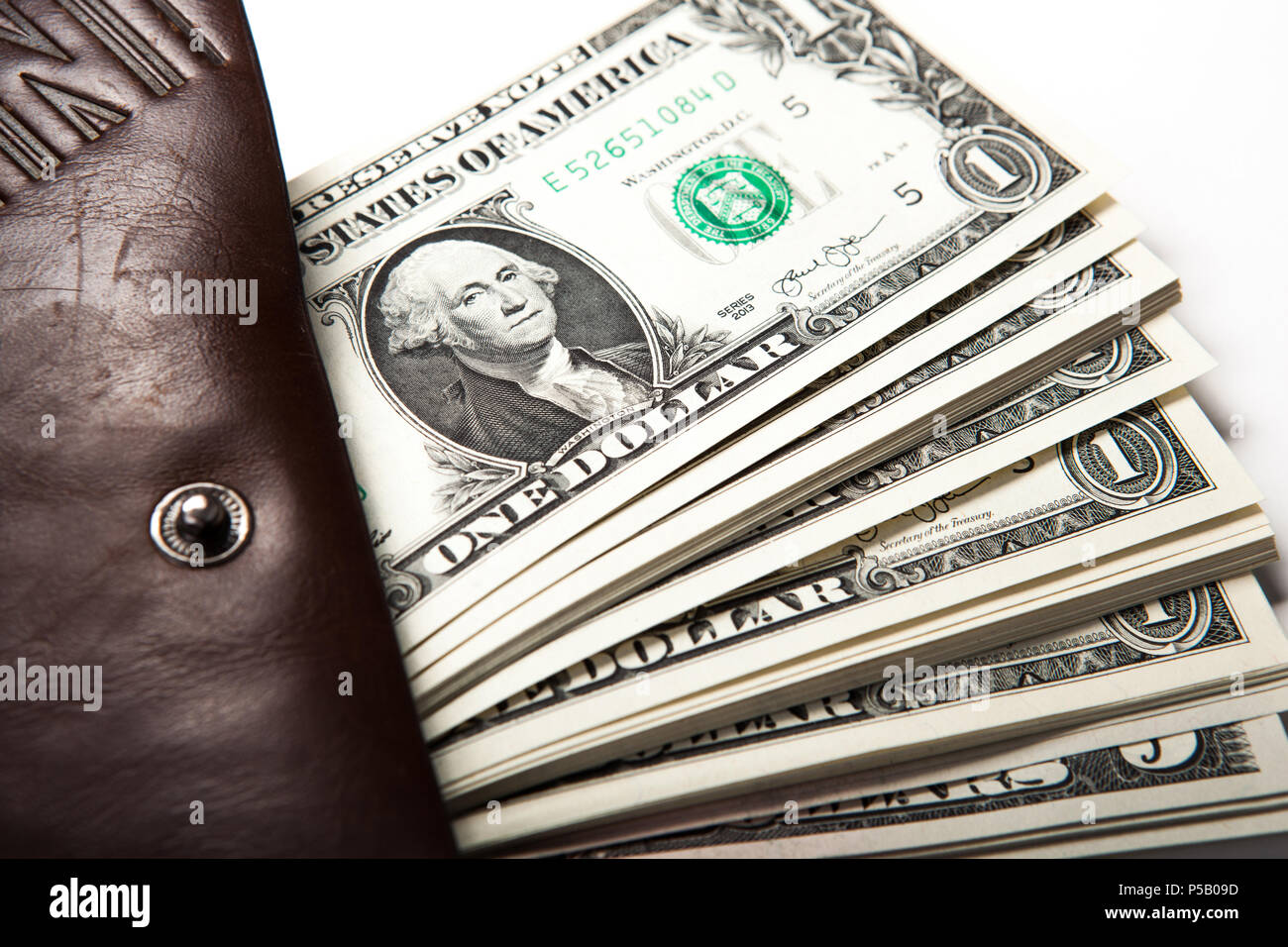 spending money in your wallet close up Stock Photo - Alamy