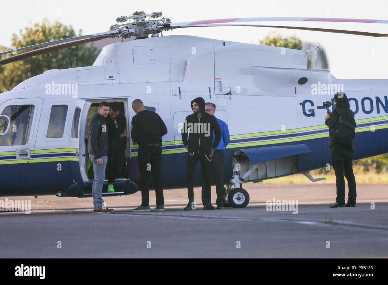 Cardiff, Wales, UK, June 22nd 2018. Helicopter passengers including ...
