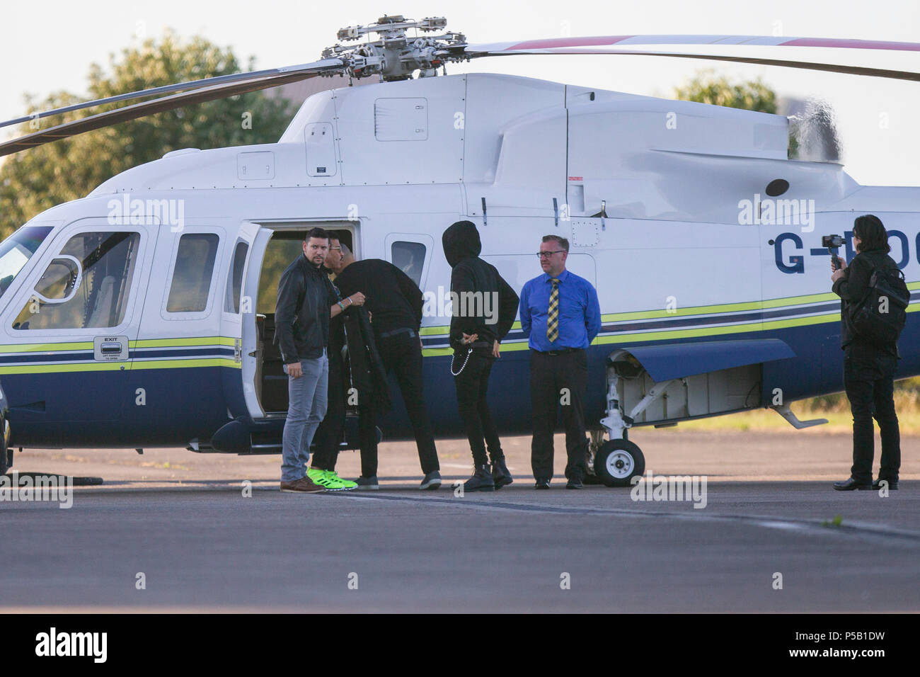 Cardiff, Wales, UK, June 22nd 2018. Helicopter passengers including ...