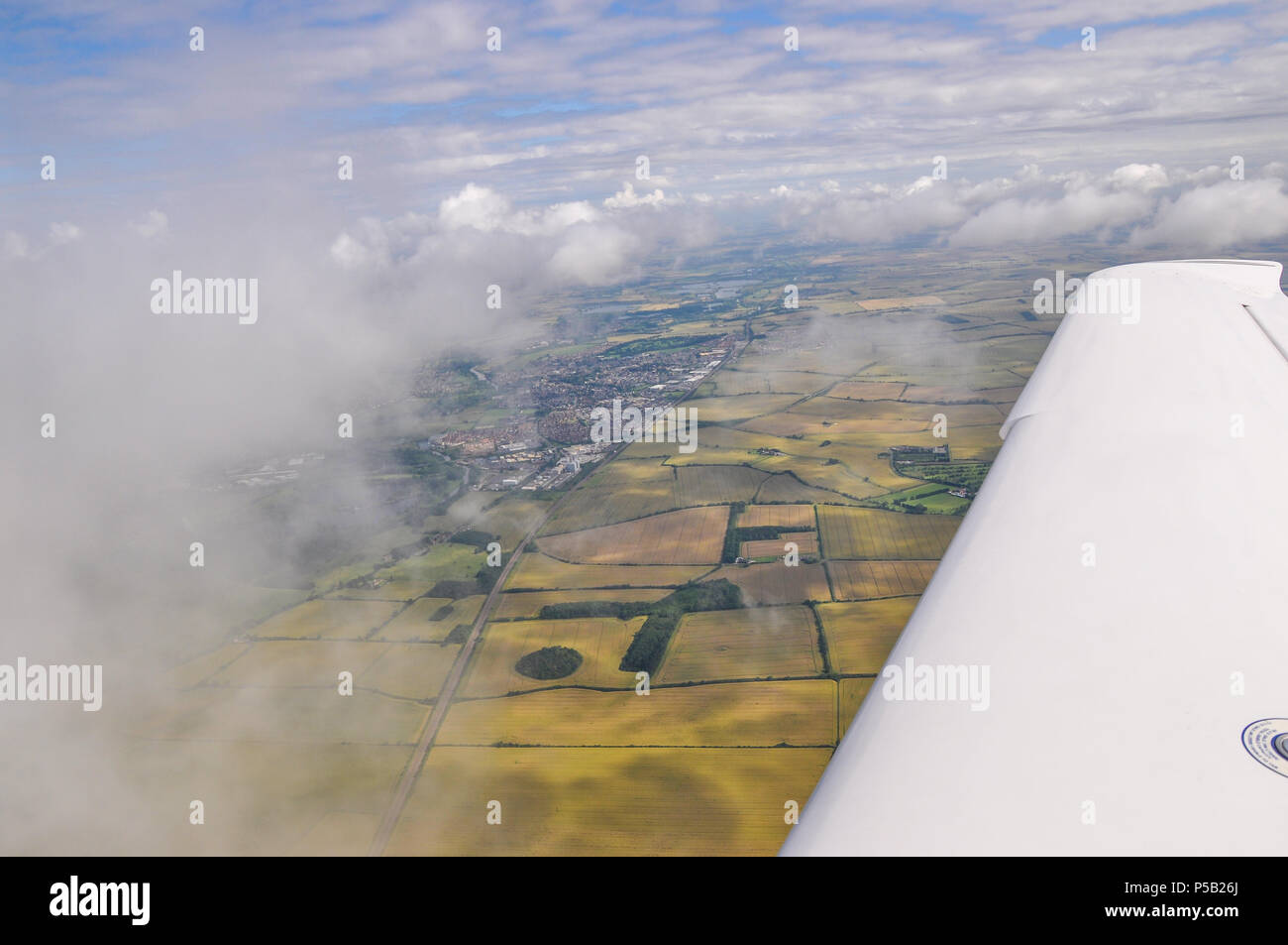 Flying through clouds in a Cirrus SR20.light aircraft plane. Cloud ...