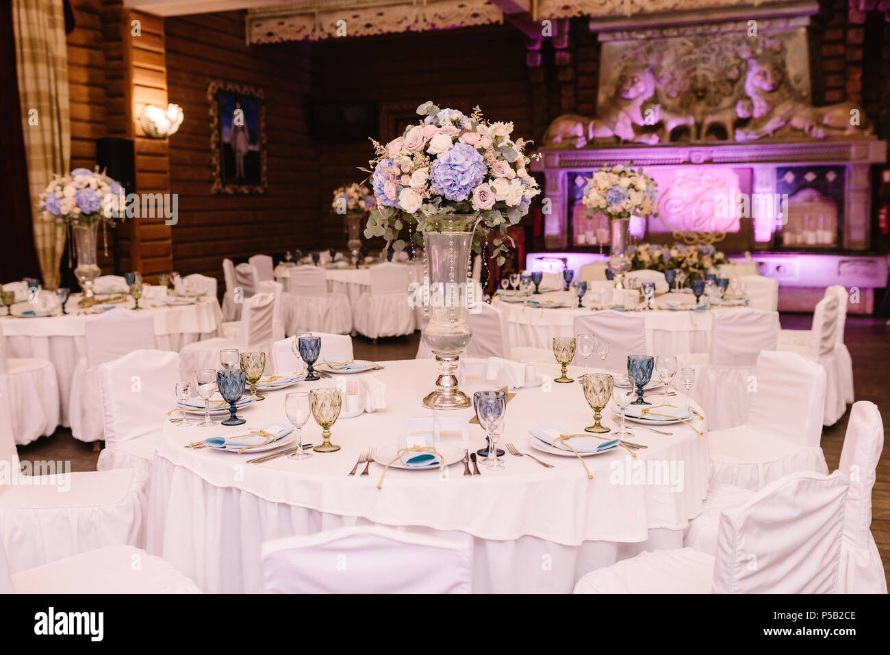 Festive lunch at restaurant. A wedding table for guests. Round banquet ...
