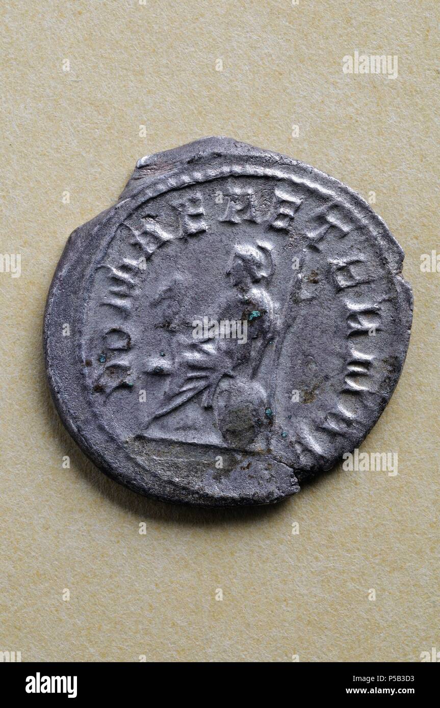 Ancient Roman coin of Fides from the archaeological site of Complutum ...