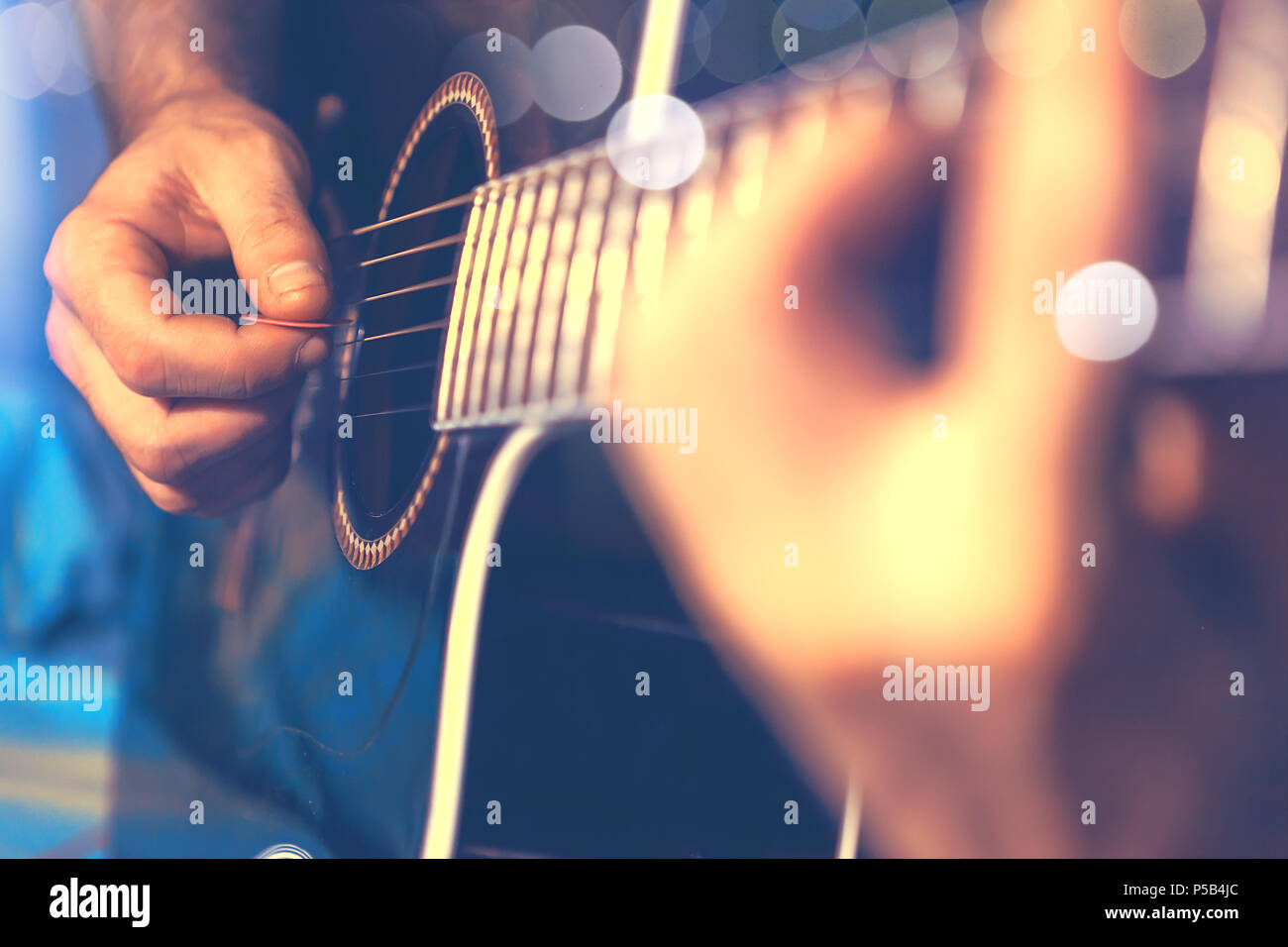 Person acoustic guitar acoustic guitar hi-res stock photography and ...