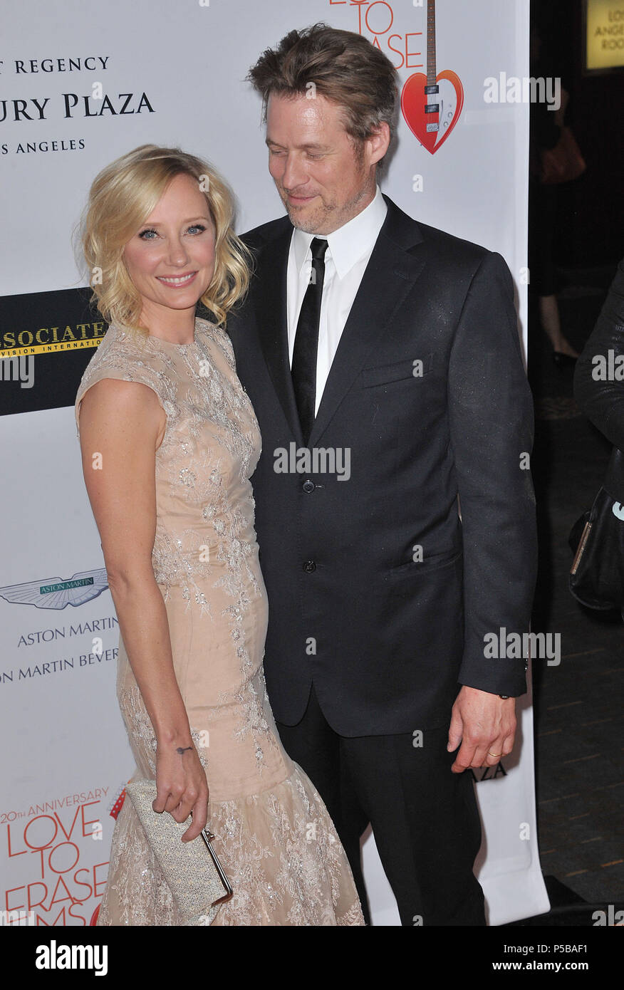 Anne Heche and husband James Tupper arriving at The 20th Ann. Race To ...