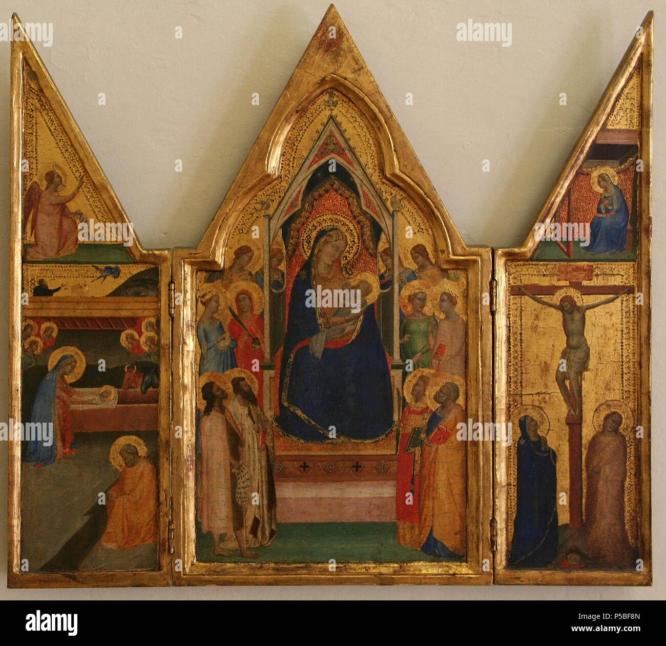 Triptych Of The Virgin Nursing The Child Flanked With Angels And Saints