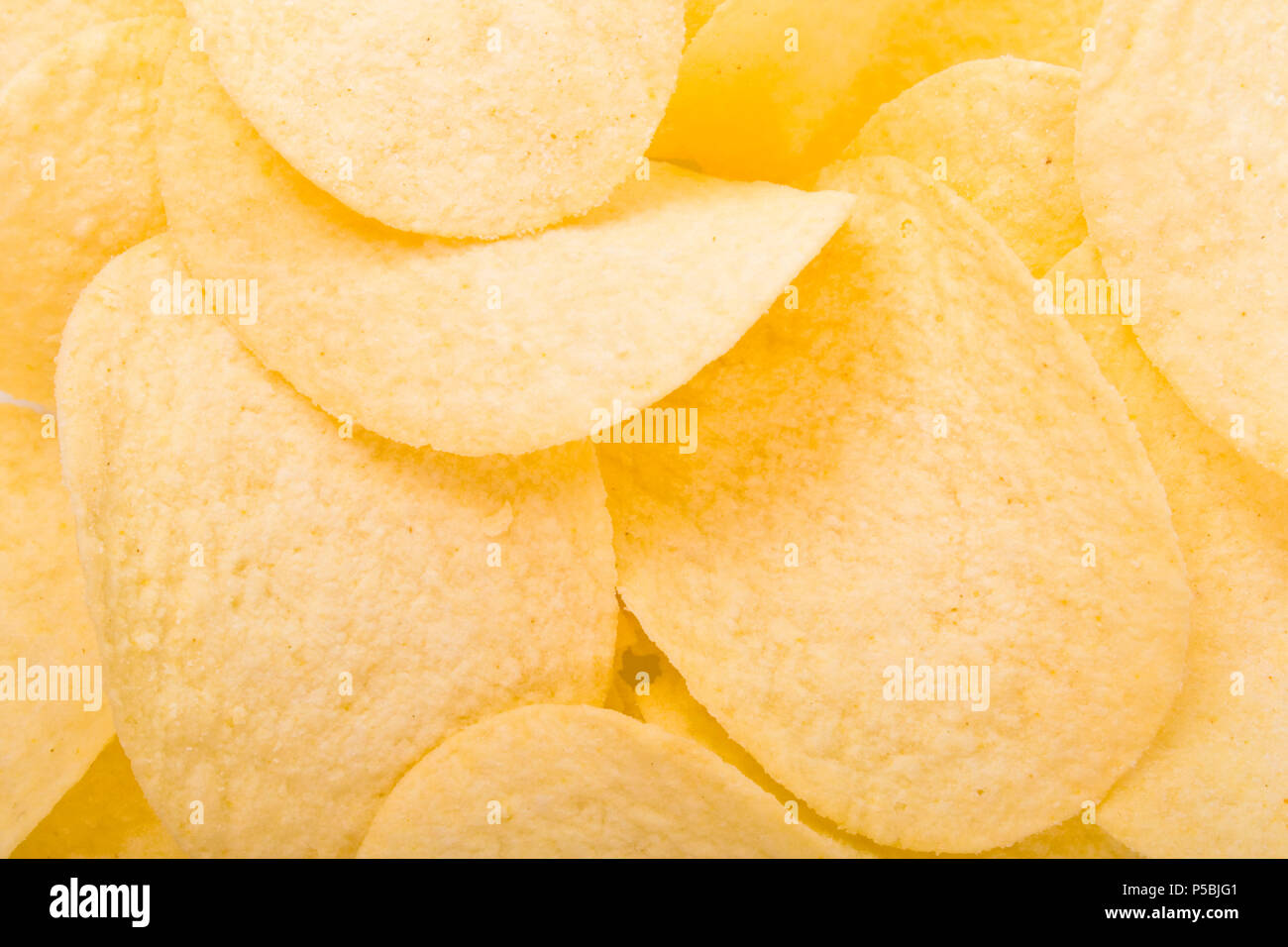 potato chips background Stock Photo - Alamy
