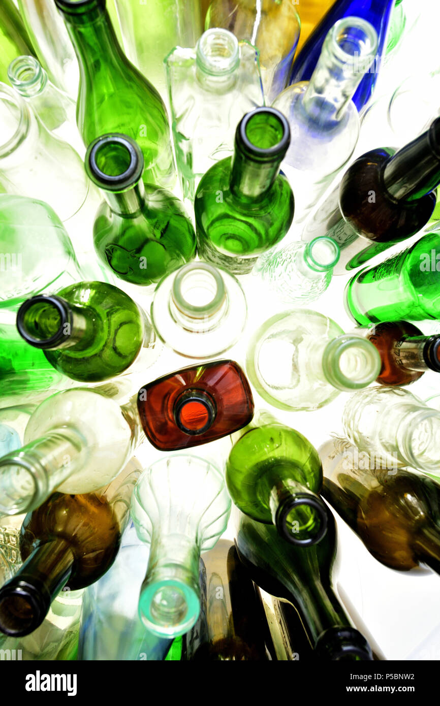 top view of glass bottles on white Stock Photo - Alamy