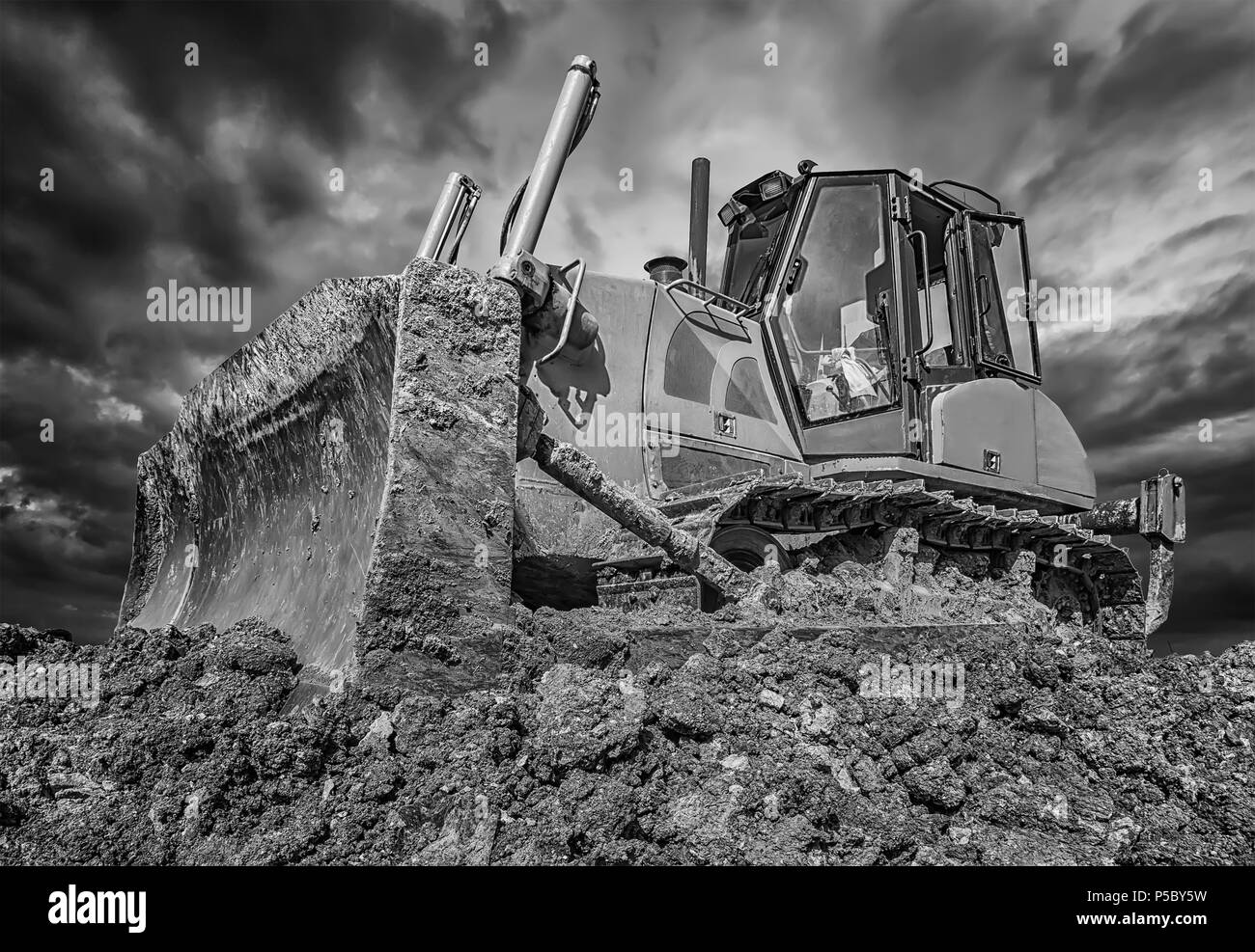 Earth mover bucket Black and White Stock Photos & Images - Alamy