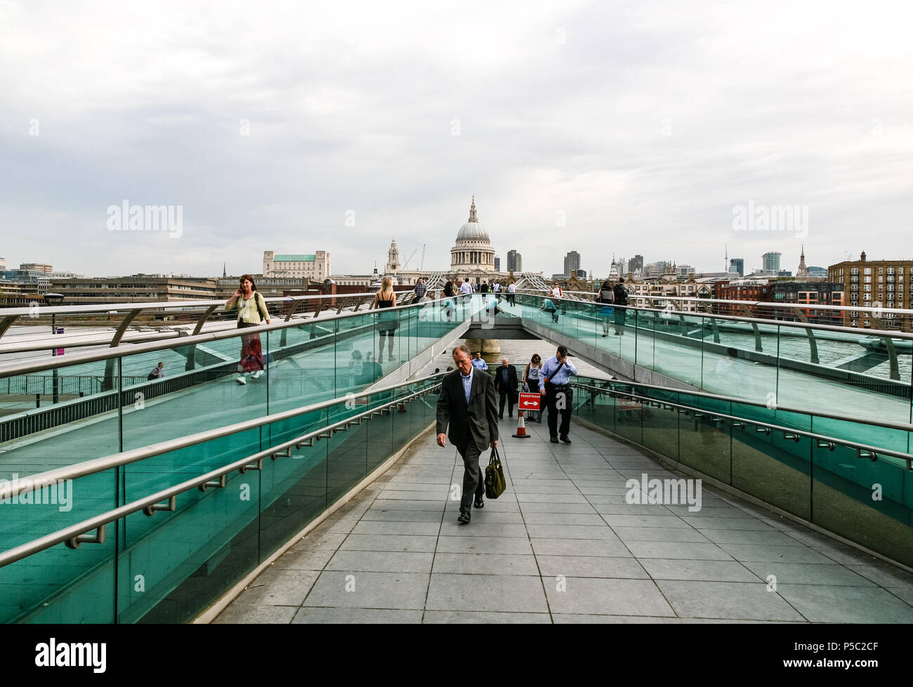 Commuters Crossing the London Millennium Suspension Footbridge ...