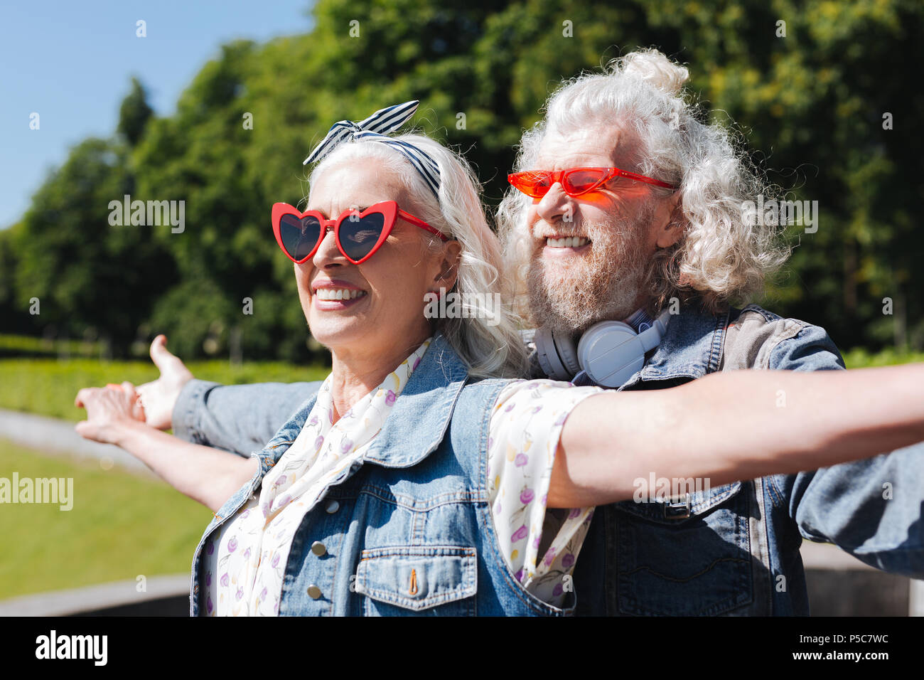 Joyful positive woman feeling free Stock Photo - Alamy