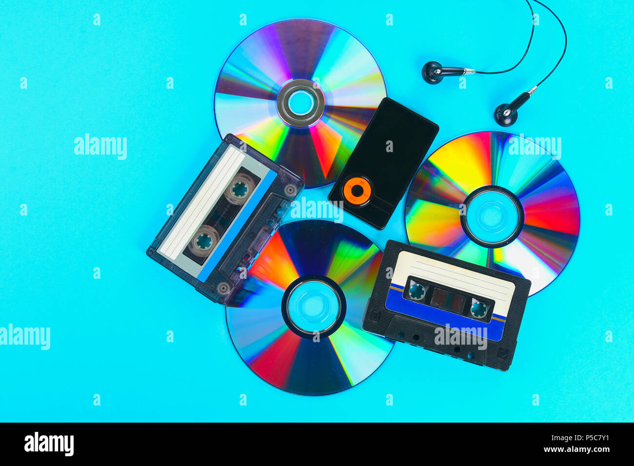 The concept of the evolution of music. Cassette, CD-disk, mp3 player ...