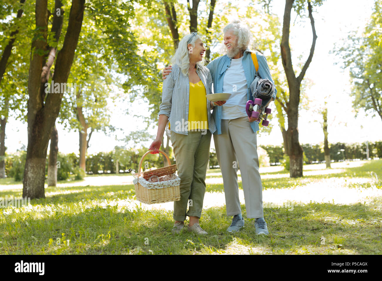 Positive nice couple going home Stock Photo - Alamy