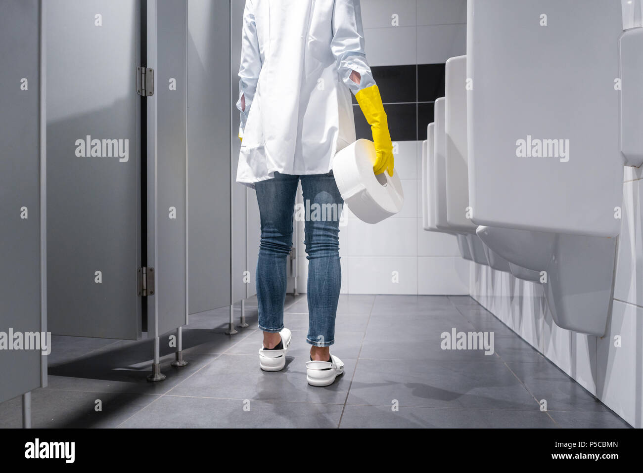 Washroom attendant hi-res stock photography and images - Alamy