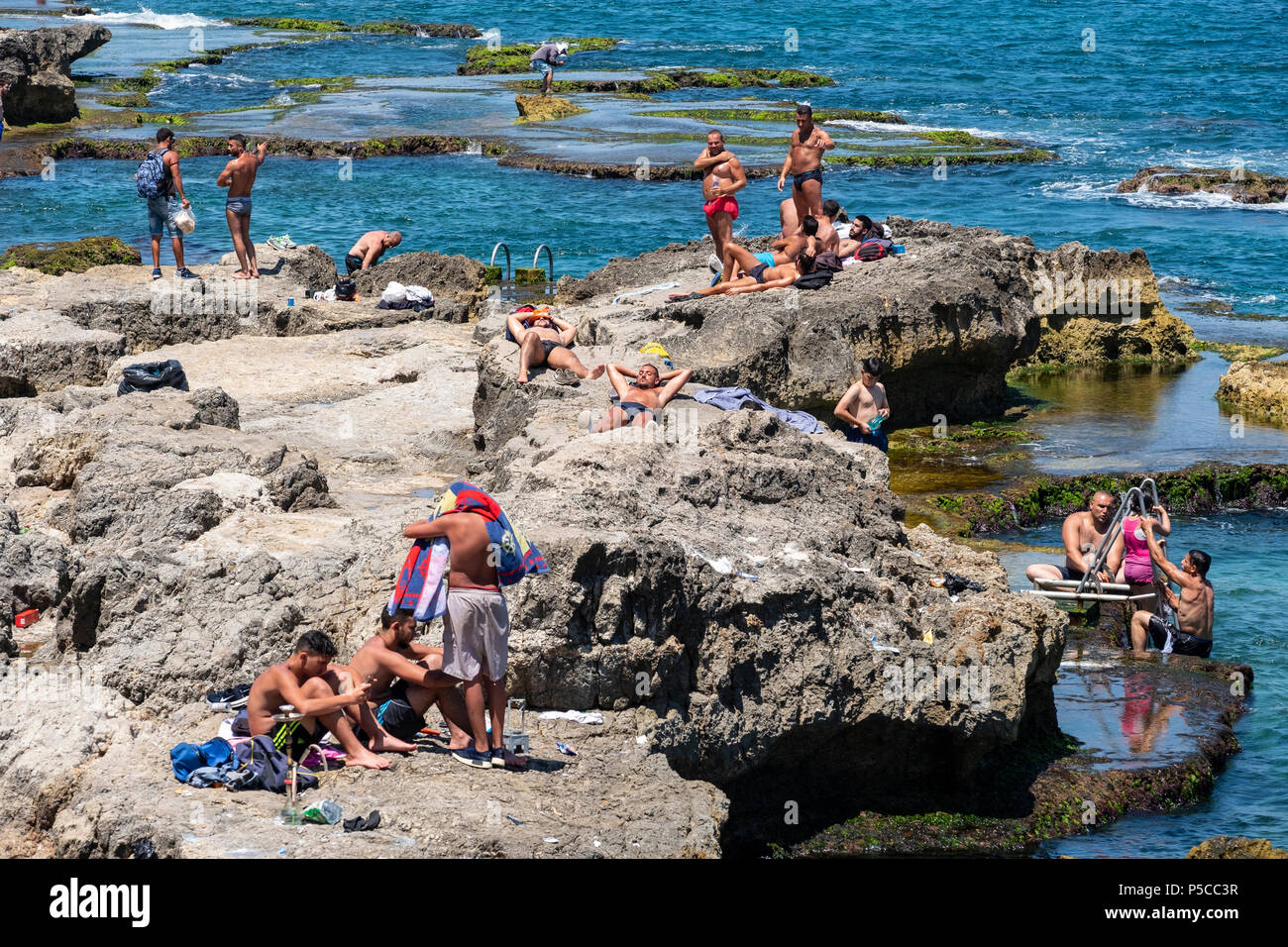 Men sunbathing hi-res stock photography and images - Alamy