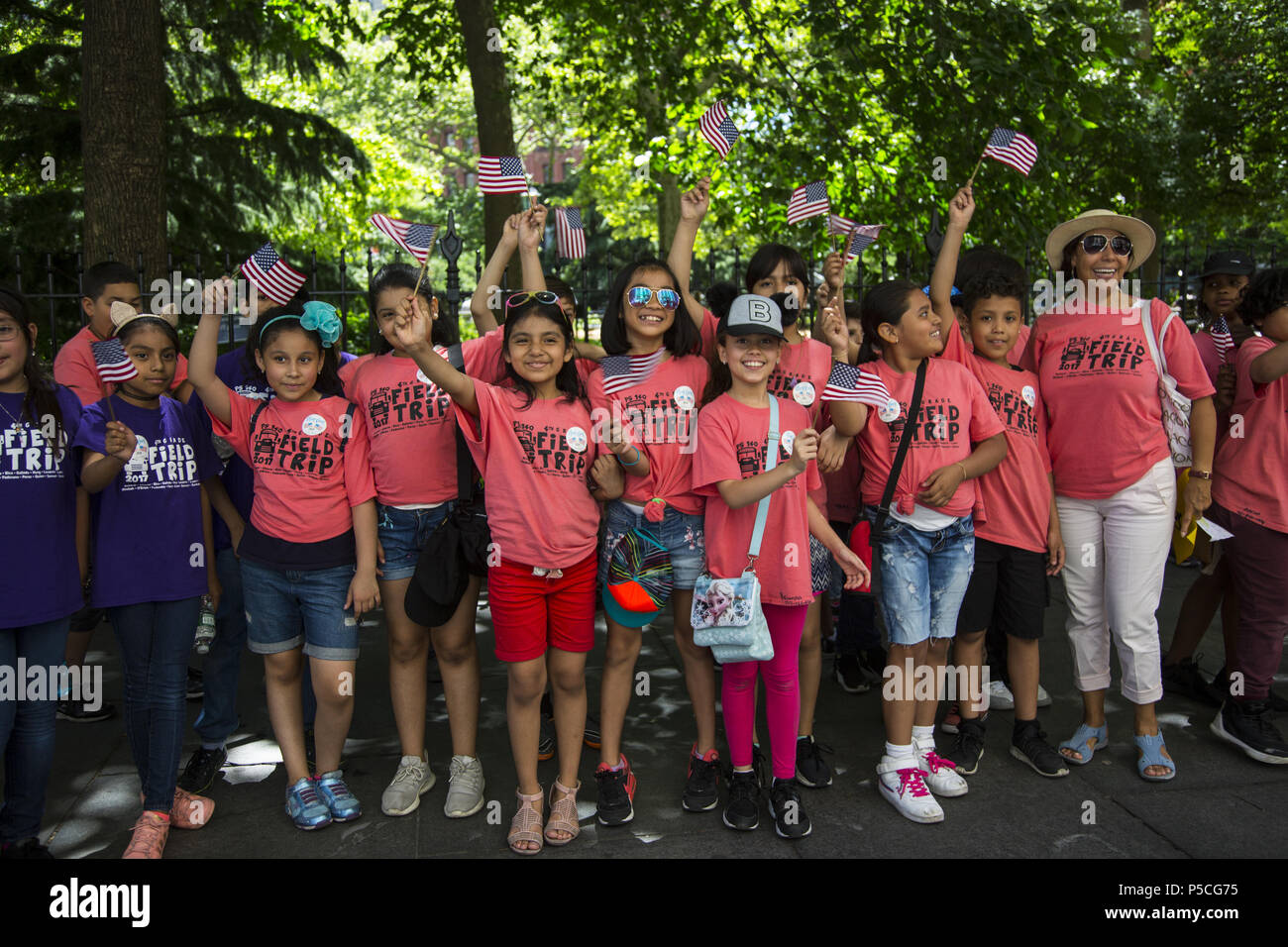 Public school children march in lower Manhattan along Broadway at the ...
