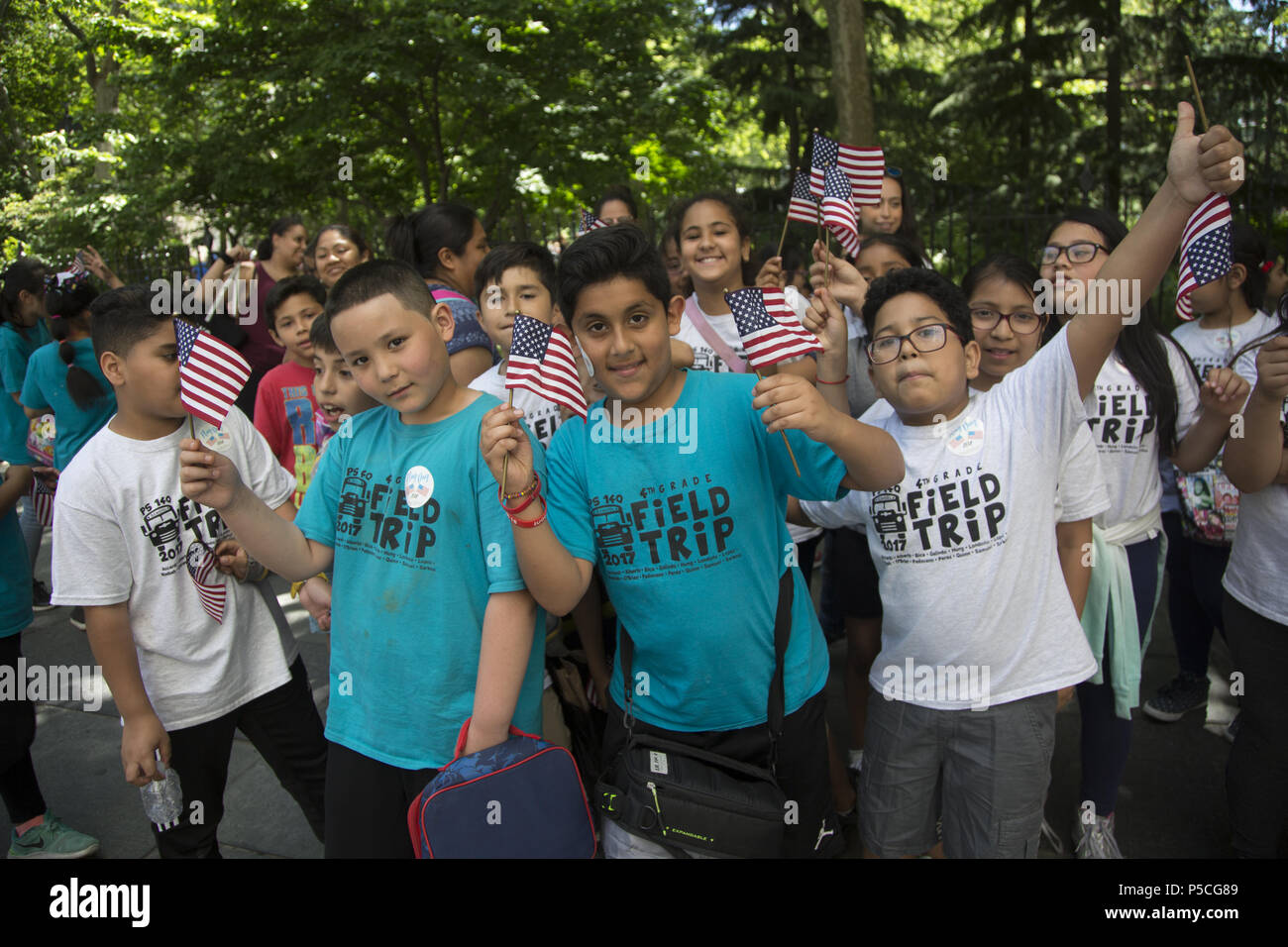 Public school children march in lower Manhattan along Broadway at the ...