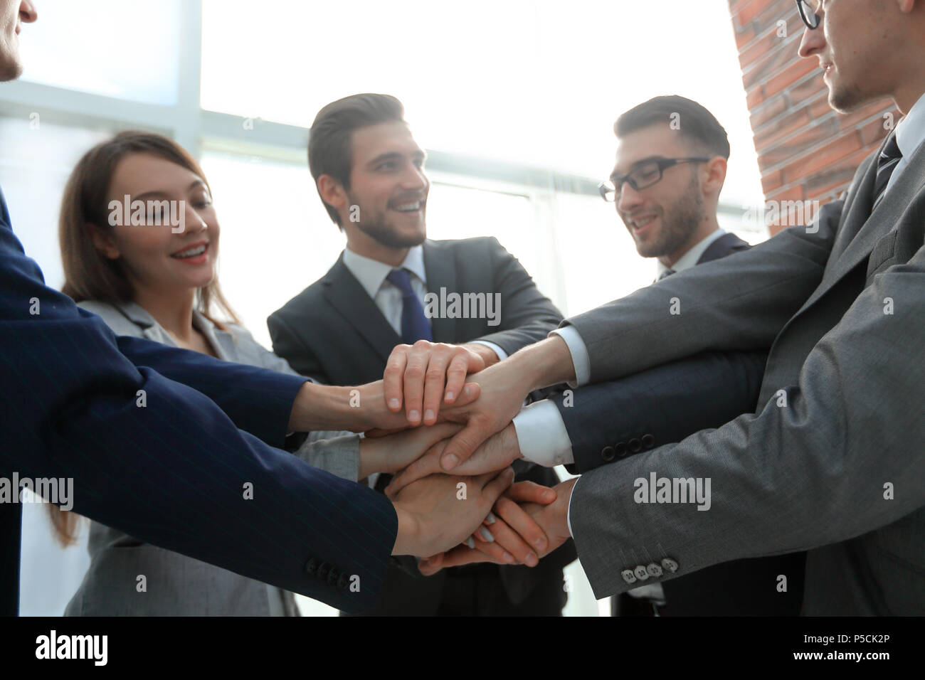 Group of Friends with Hands in Stack, Teamwork Stock Photo - Alamy