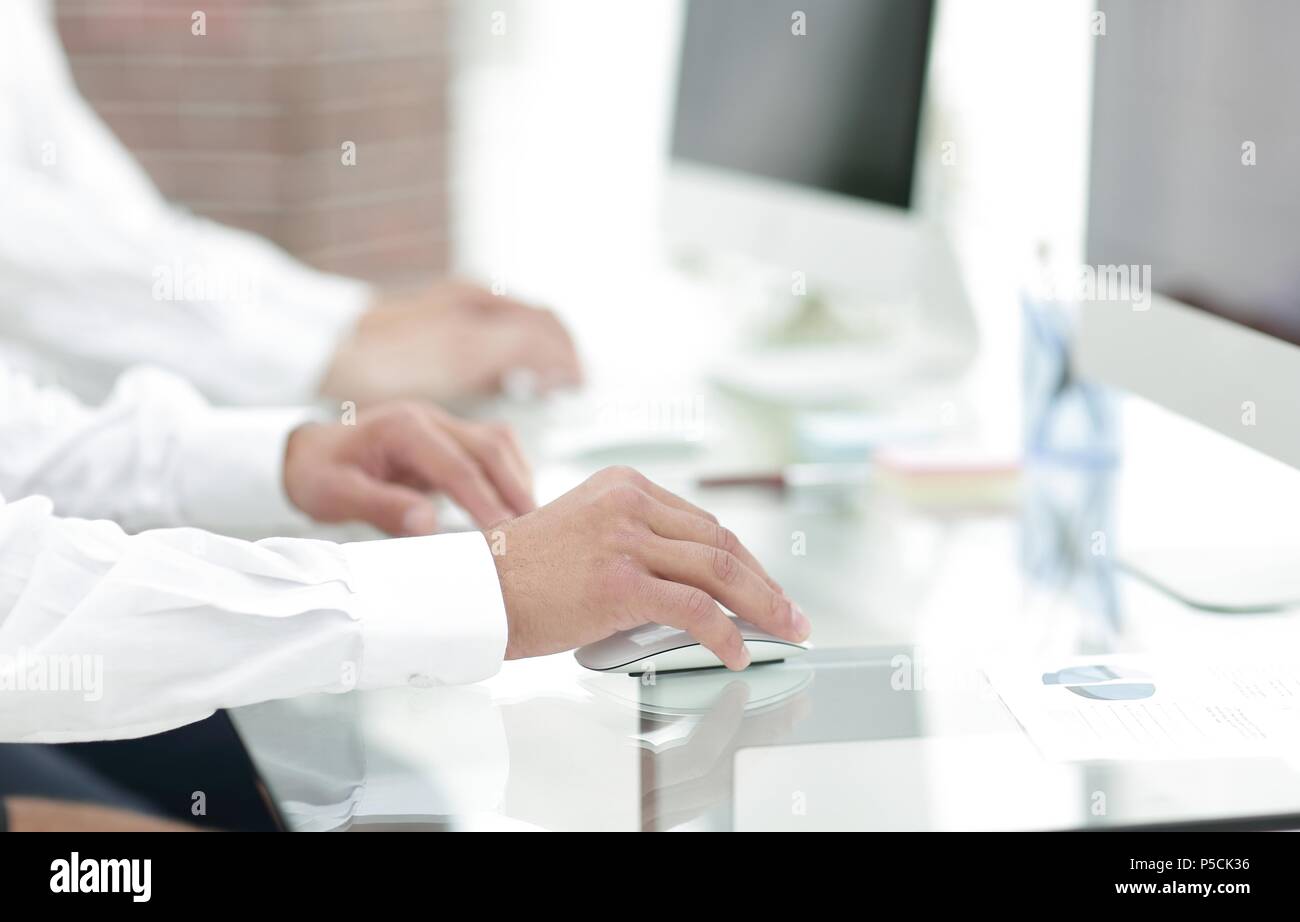 hands typing text on the computer keyboard. blurred business background Stock Photo - Alamy