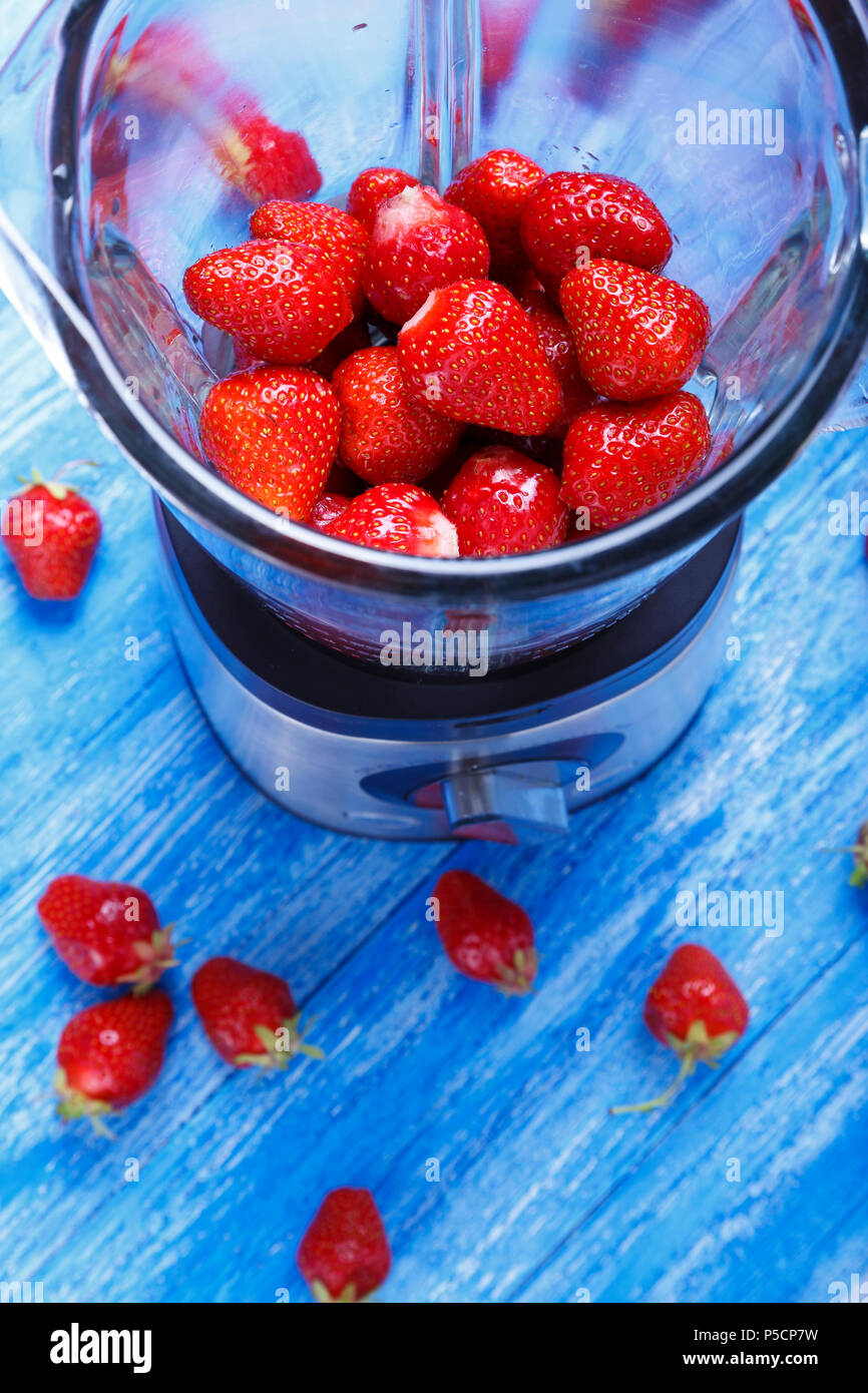 Strawberries into blender jar hi-res stock photography and images - Alamy