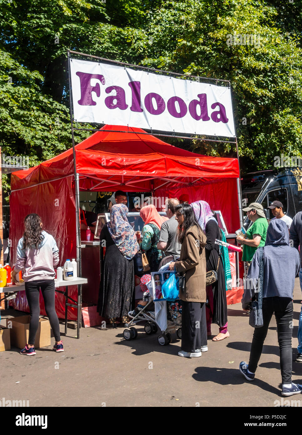 People queueing at a food stall selling Falooda at Glasgow Mela, 2018 ...