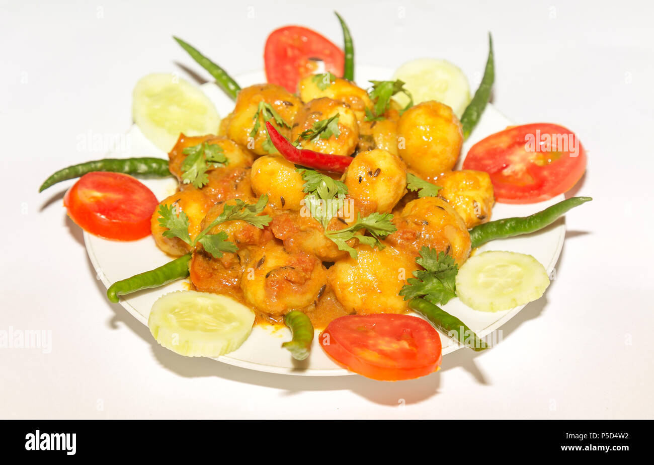 Spicy Indian vegetarian food prepared with small potatoes popularly ...