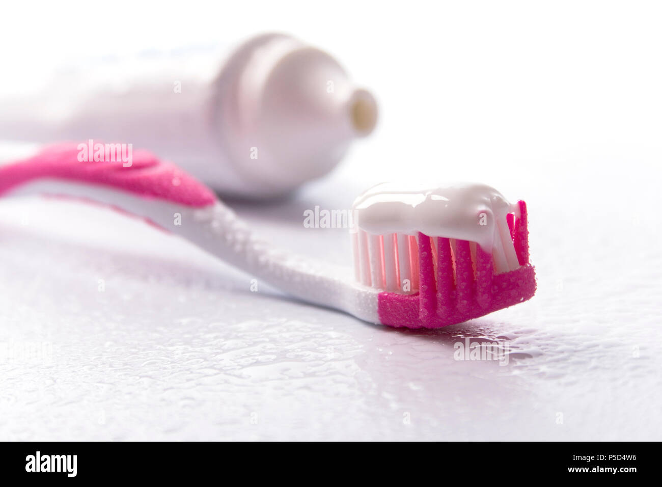toothpaste and toothbrush on white. dental care Stock Photo - Alamy