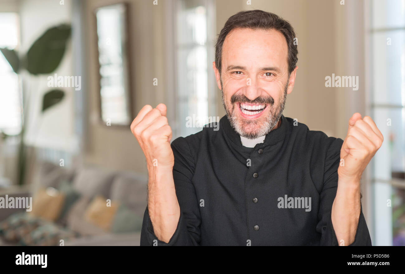 Christian priest man screaming proud and celebrating victory and ...