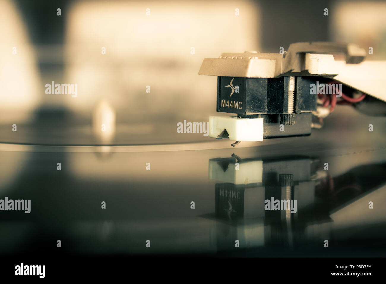 Vinyl turntable spinning a record Stock Photo - Alamy