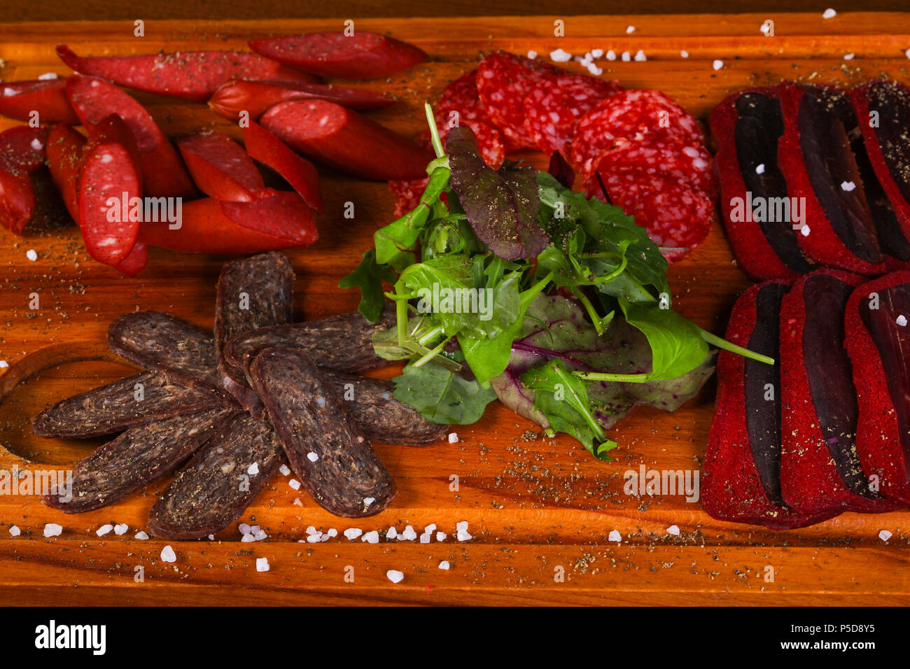 Sausages plate mix snack Stock Photo - Alamy