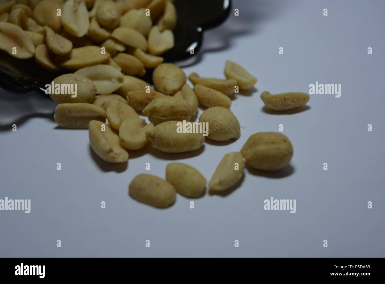 Delicious and healthy food, nuts, lots of peanuts arranged in a black ...