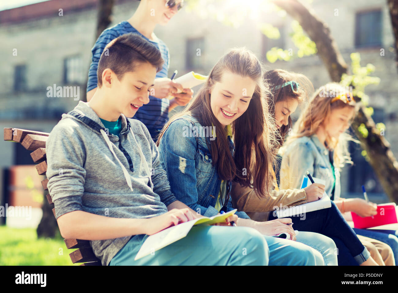 group of students with notebooks at school yard Stock Photo - Alamy