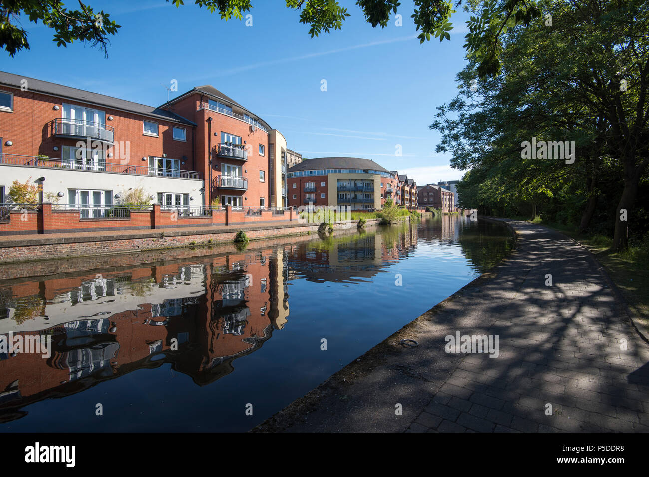 Apartments reflected in the Canal at Nottingham City Waterfront ...