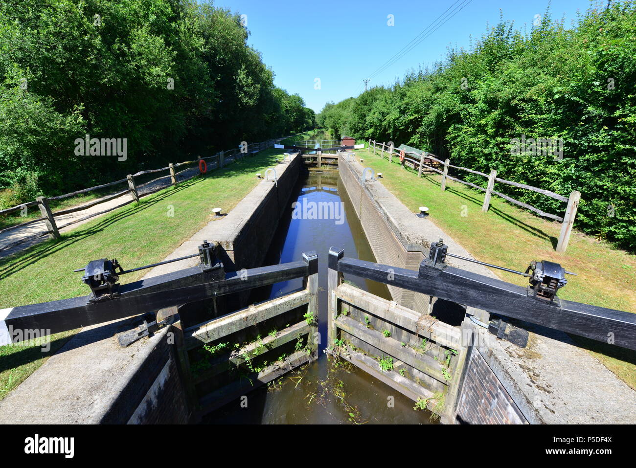 A Canal Lock on the Wey and Arun canal in England in summertime Stock ...