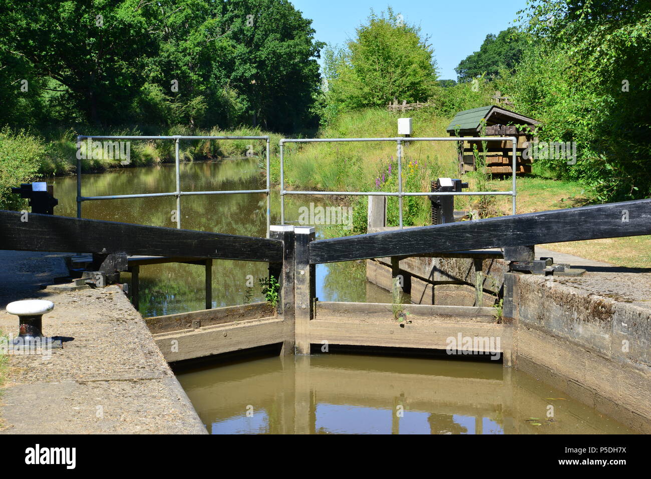 A Canal Lock on the Wey and Arun canal in England in summertime Stock ...