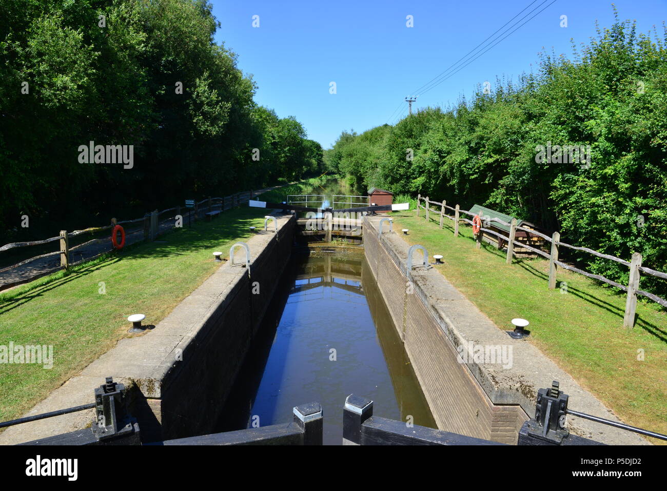 A Canal Lock on the Wey and Arun canal in England in summertime Stock ...