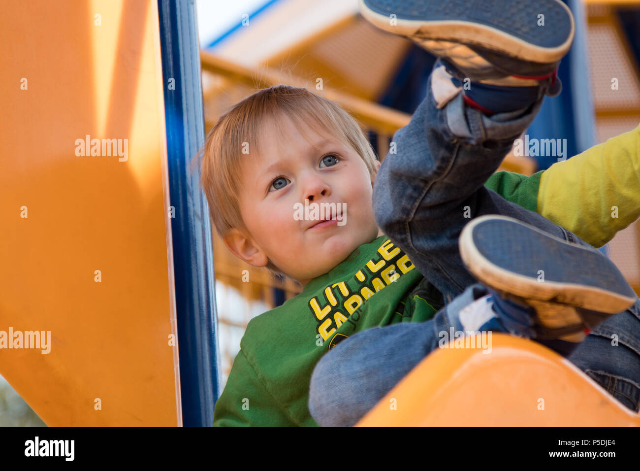 Boy At Playground Stock Photo - Alamy