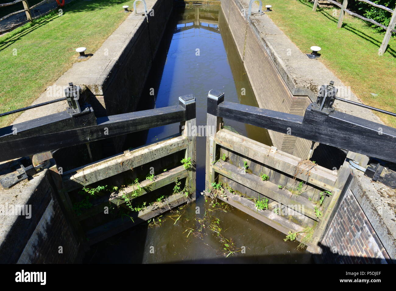 A Canal Lock on the Wey and Arun canal in England in summertime Stock ...